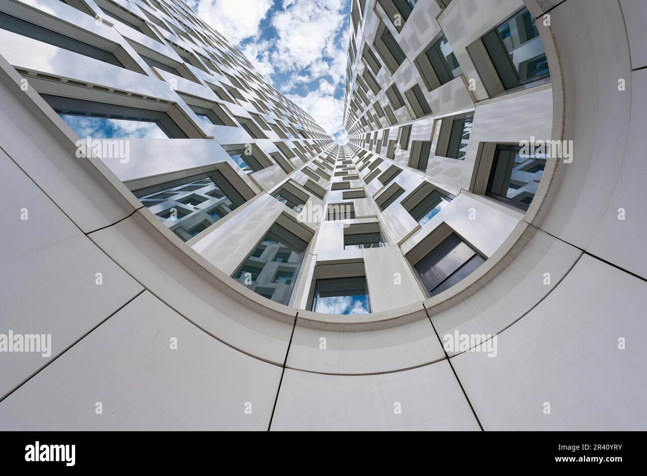 Looking up, at the facade of a high-rise building in downtown Berlin ...