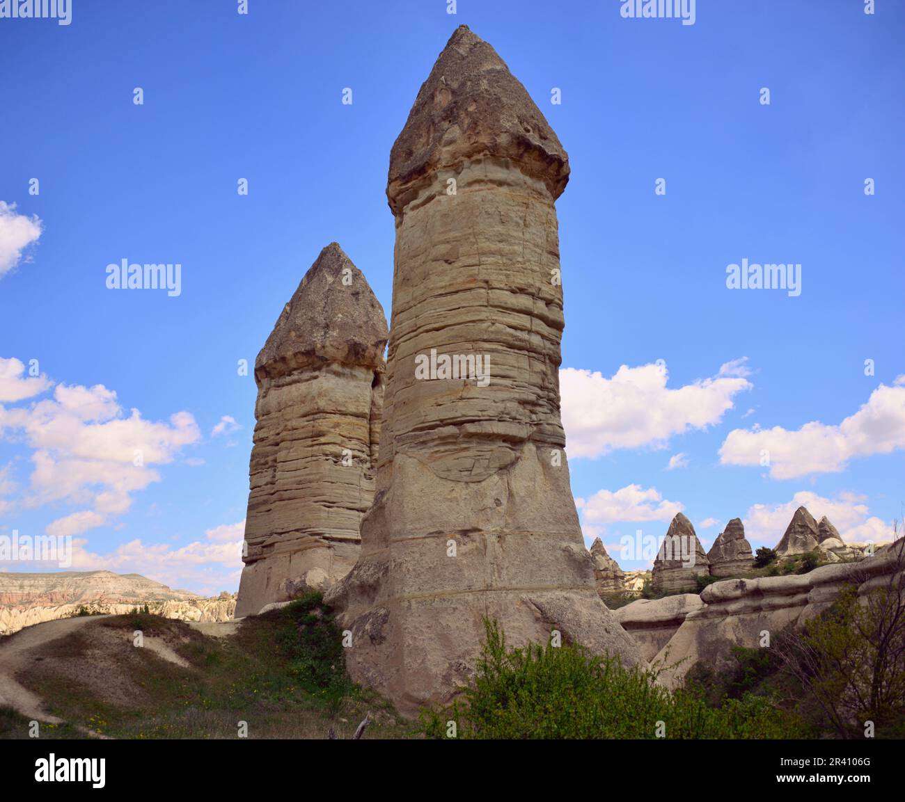 Goreme, positioned between the rock formations called fairy chimneys ...