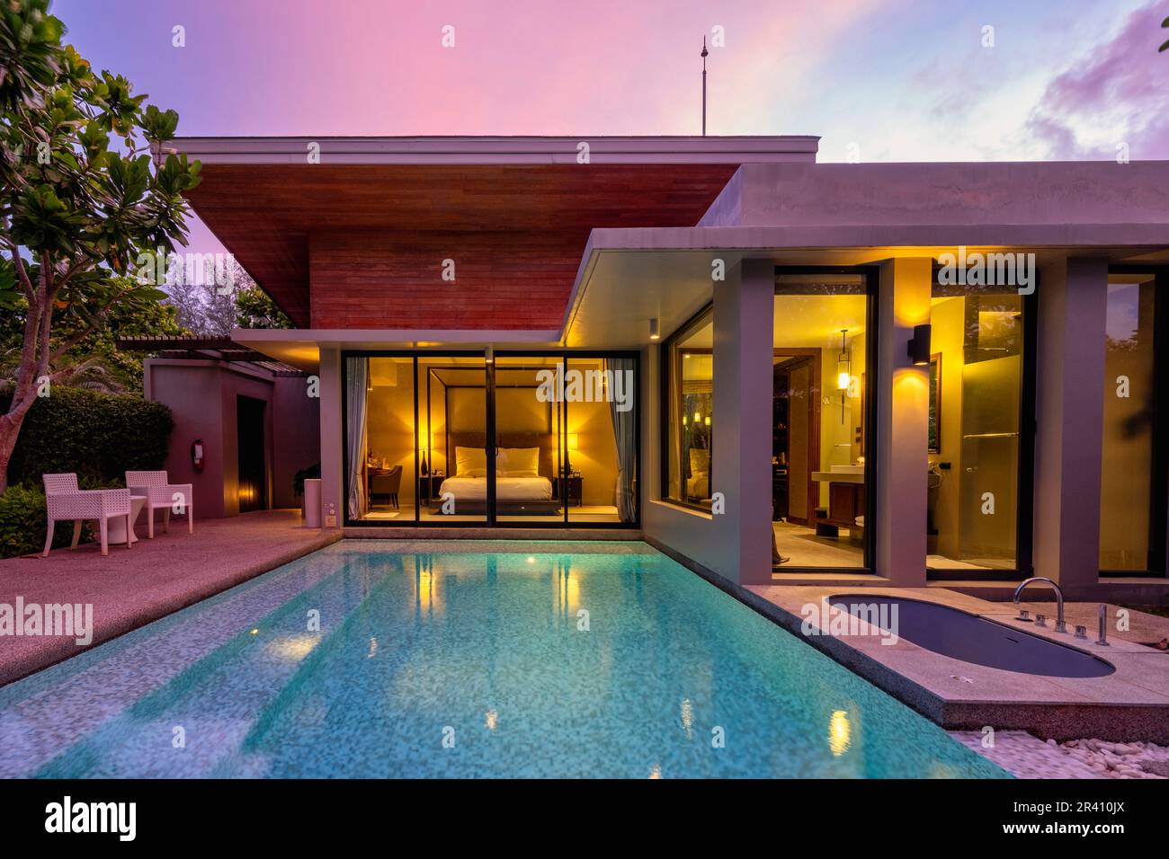 Modern house with a swimming pool, modern pool villa at the beach Stock ...