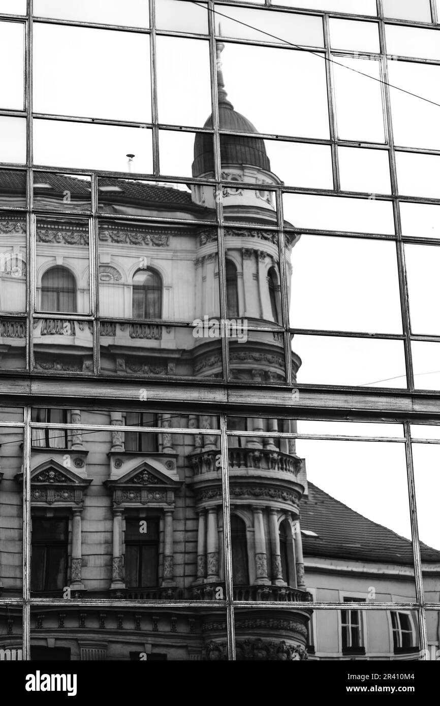 A reflection of a historic Art Nouveau apartment building in a modern ...