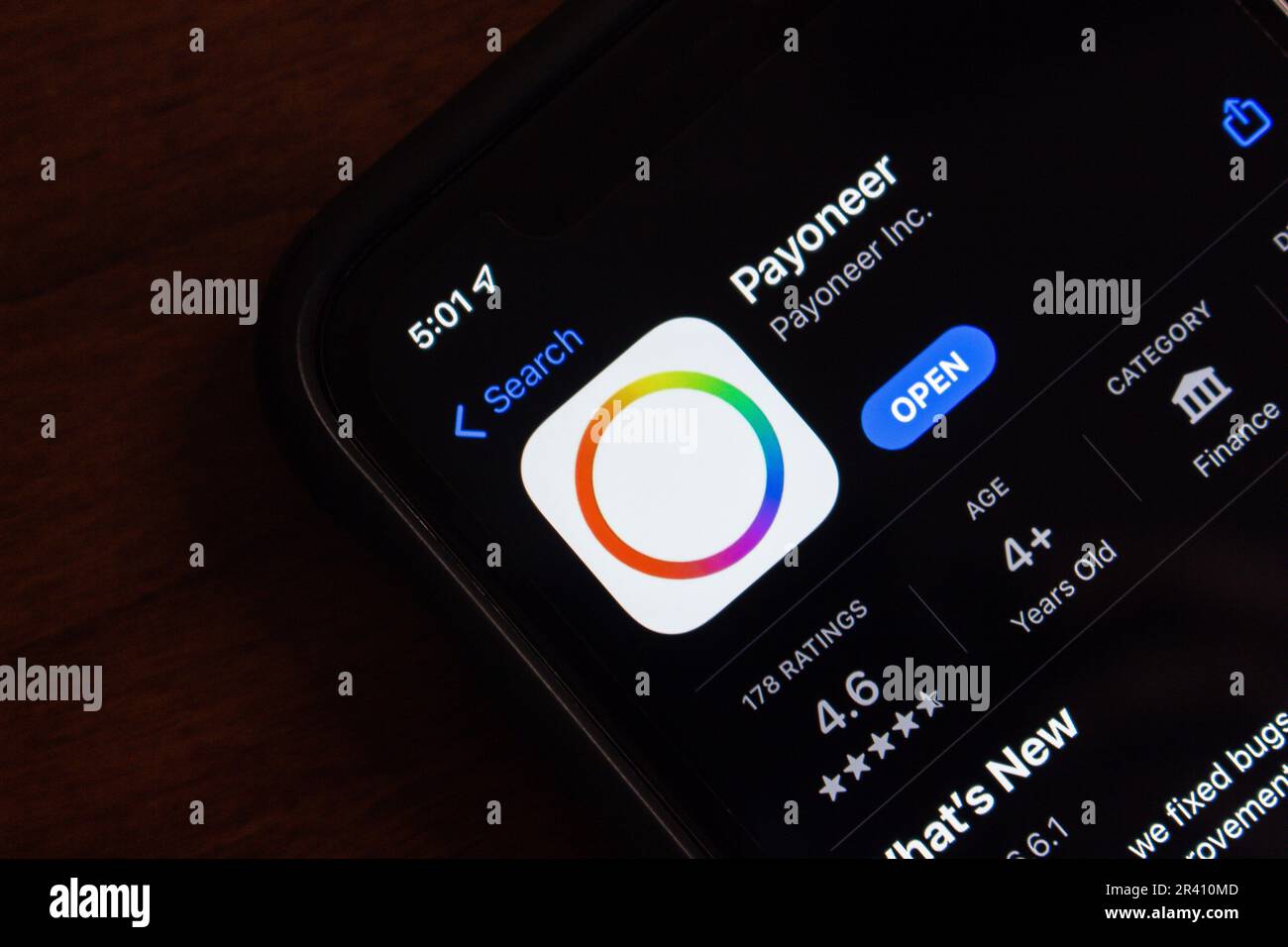 Payoneer app icon seen in an App Store on an iPhone screen. Payoneer is ...