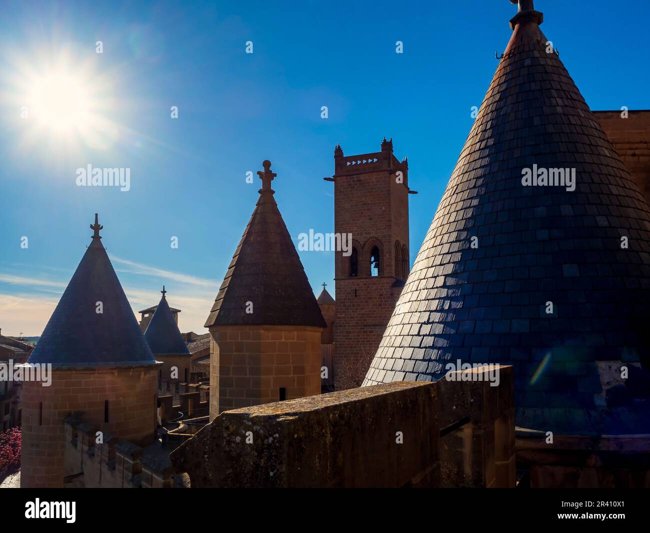 A panoramic view of the medieval façades and towers in Olite, Navarre ...