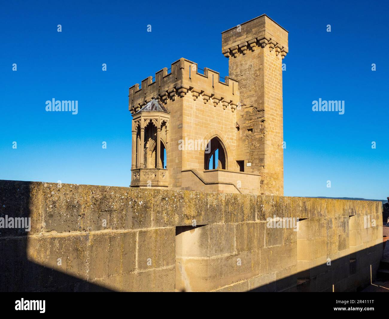 A panoramic view of the medieval façades and towers in Olite, Navarre ...