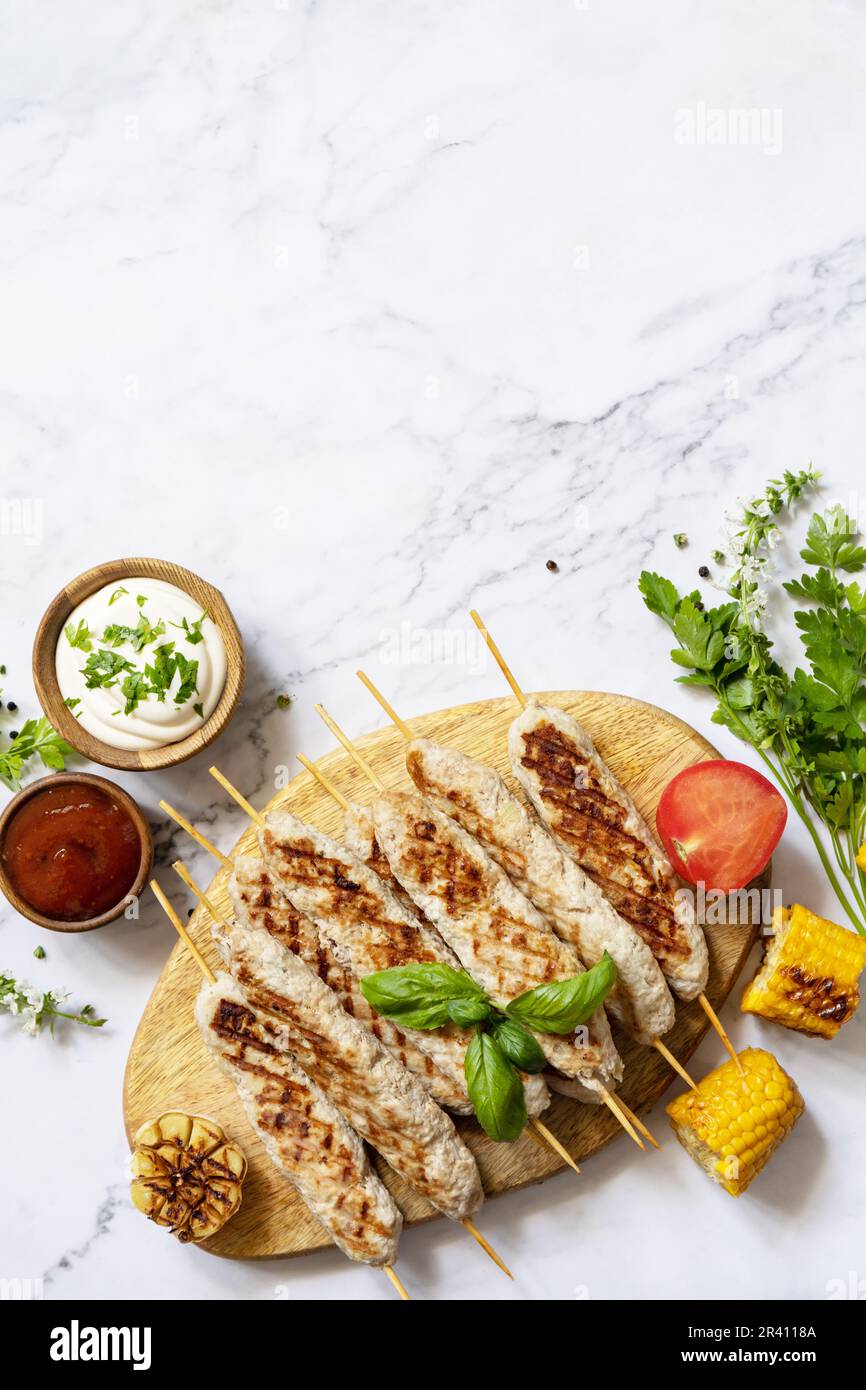 Summer party food. Grill food menu. Bbq grilled chicken kebab with ...