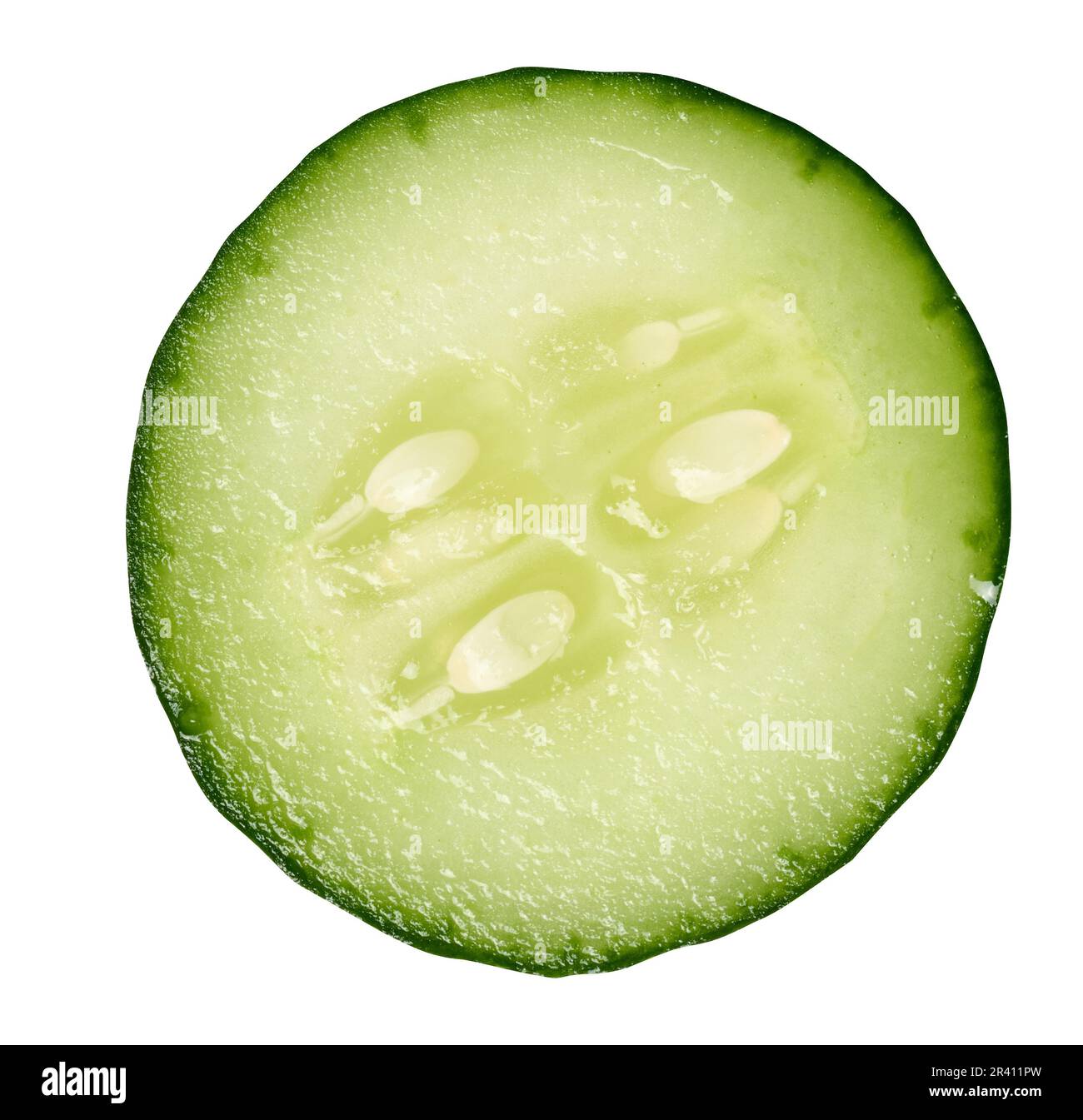 A round slice of fresh cucumber on a white isolated background, an ...