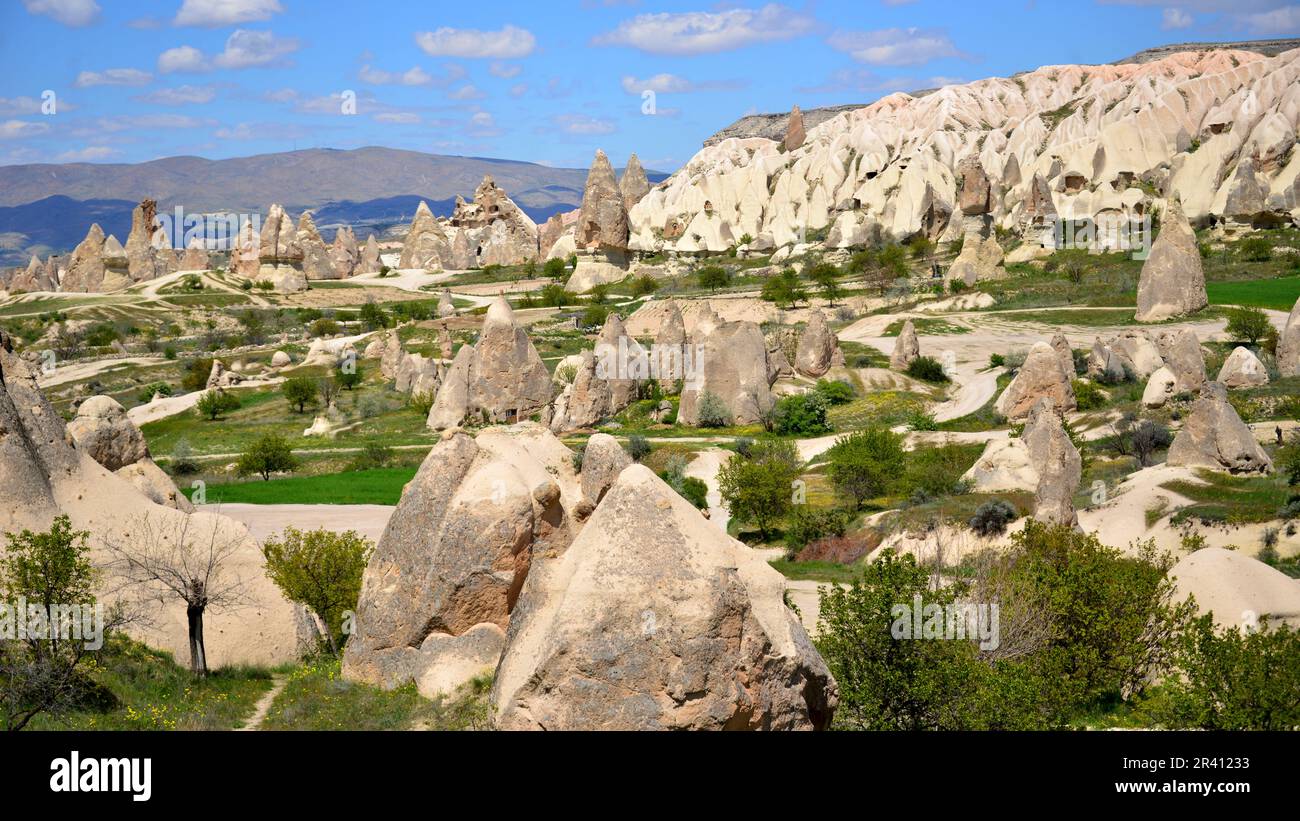 Goreme, positioned between the rock formations called fairy chimneys ...