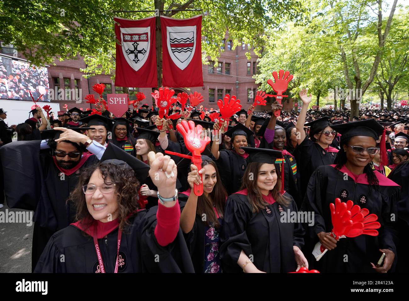 Graduating Harvard University students celebrate their graduate degrees ...