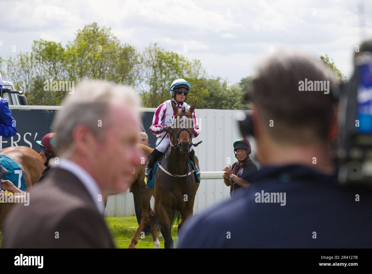 Jockey Duran Fentiman on Just Frank seen between ITV's Mick Fitzgerald ...