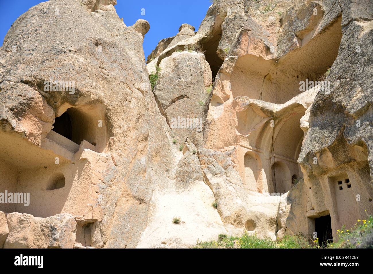 Goreme, positioned between the rock formations called fairy chimneys ...
