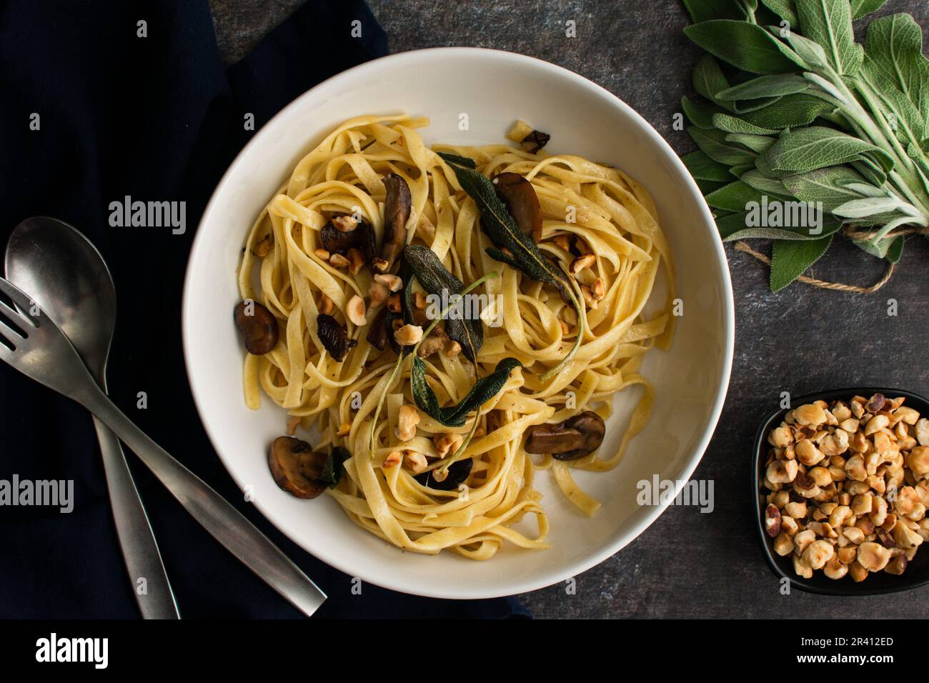 Tagliatelle with Mushrooms, Sage Butter, and Toasted Hazelnuts in a ...