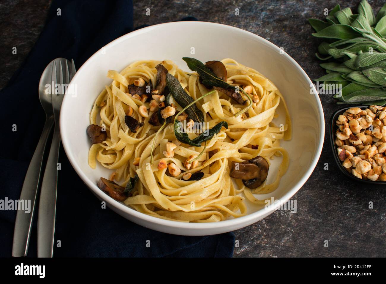Tagliatelle with Mushrooms, Sage Butter, and Toasted Hazelnuts in a ...