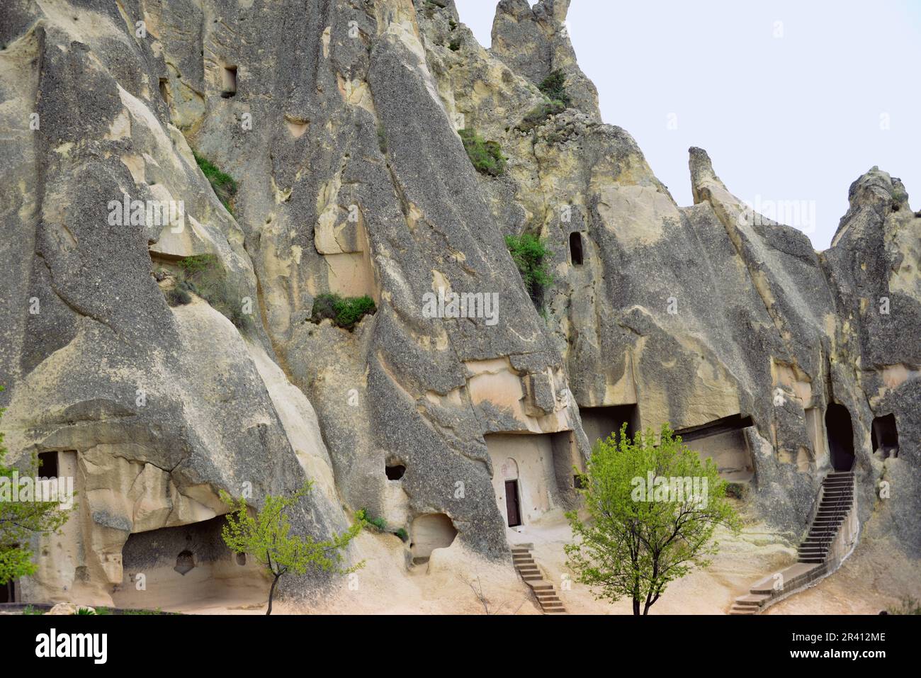 Goreme, positioned between the rock formations called fairy chimneys ...
