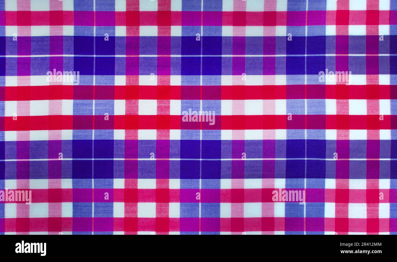 The texture of linen fabric in a large cell of red and blue. Scottish ...
