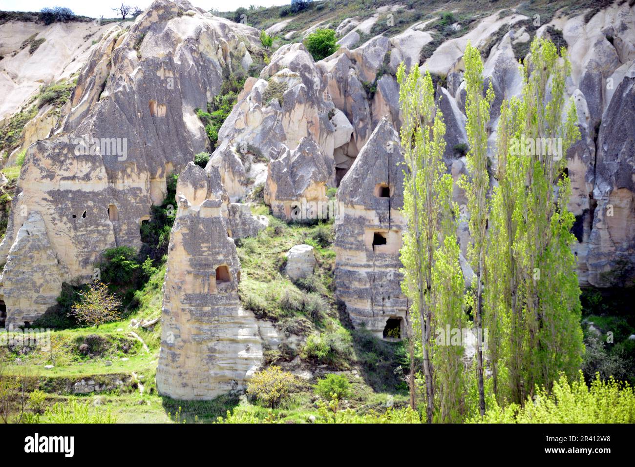 Goreme, positioned between the rock formations called fairy chimneys ...