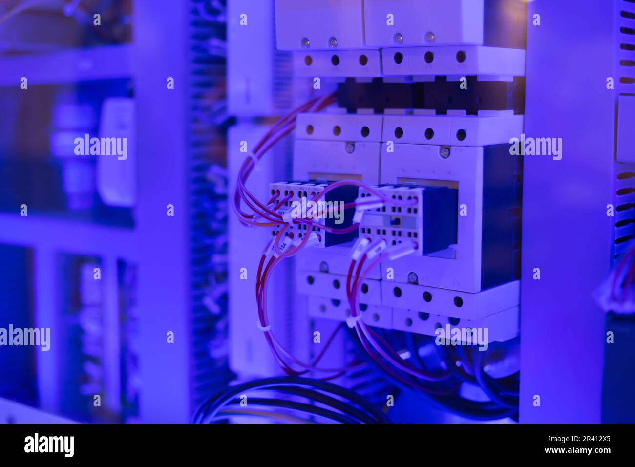 Contactor for switching electrical power circuit with purple ...