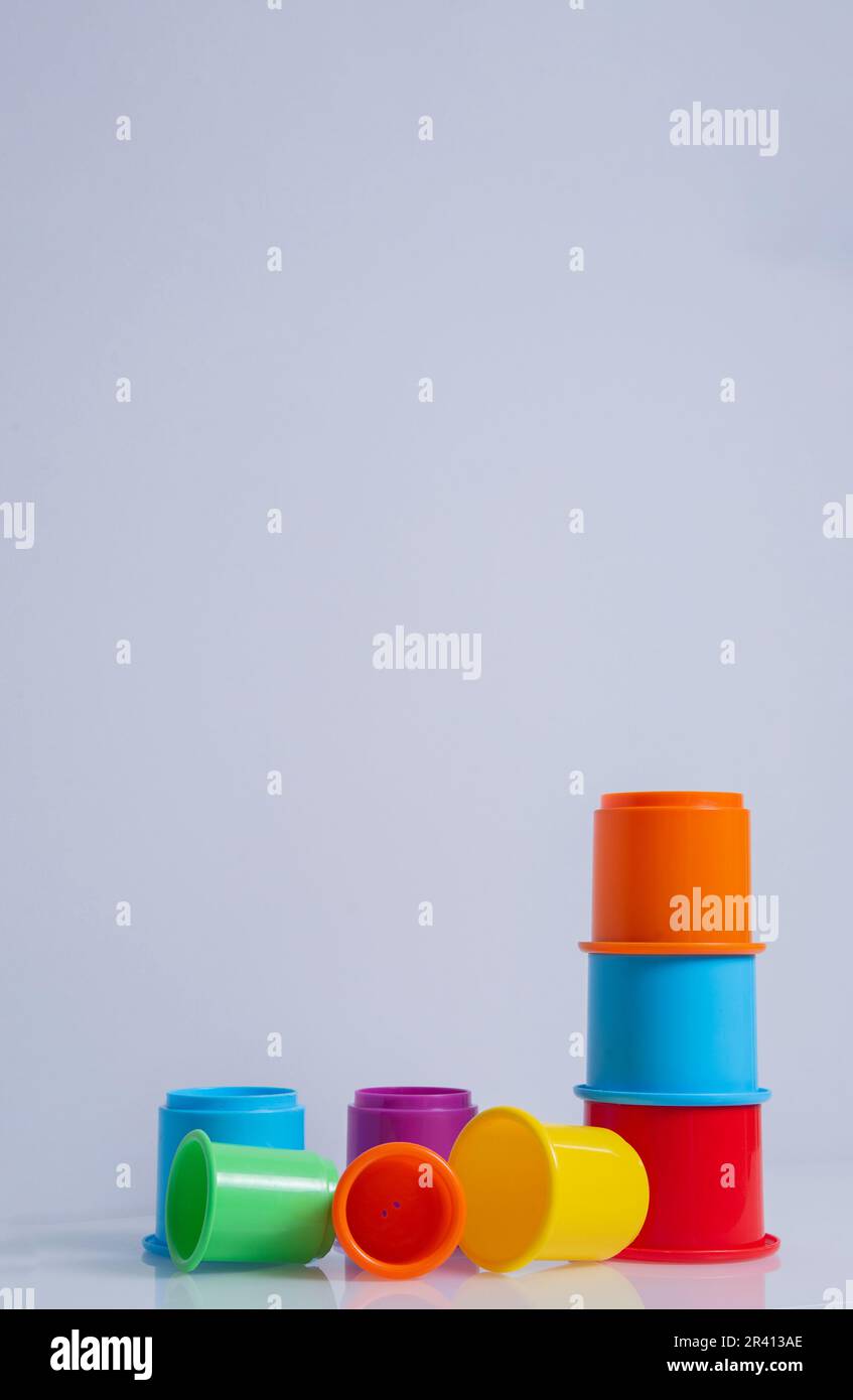 Colorful stacking plastic cups on white background.balance concept Stock Photo - Alamy