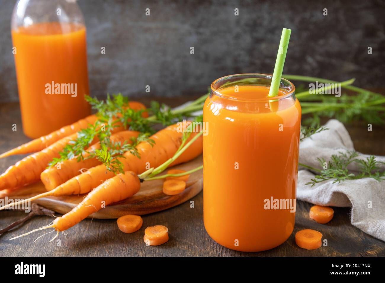Healthy food concept, fresh natural juice. Glass jar of fresh carrot ...