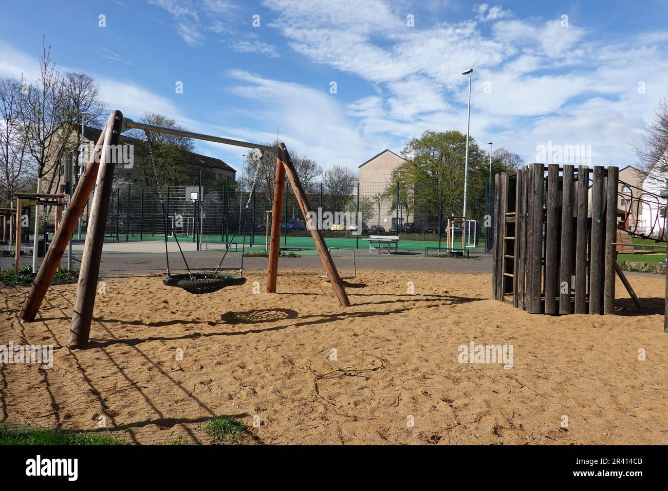 Playground and sports field in a residential area Stock Photo - Alamy