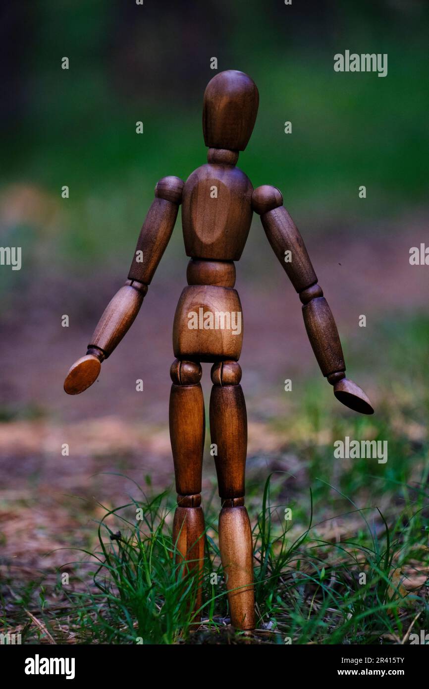 Lonely mannequin wandering through forest.Concept ecological ...