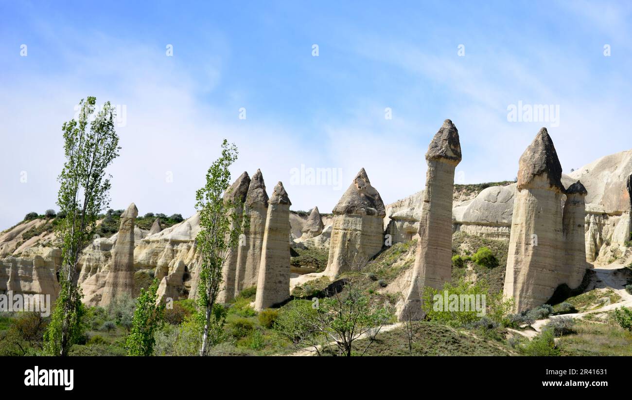 Goreme, positioned between the rock formations called fairy chimneys ...