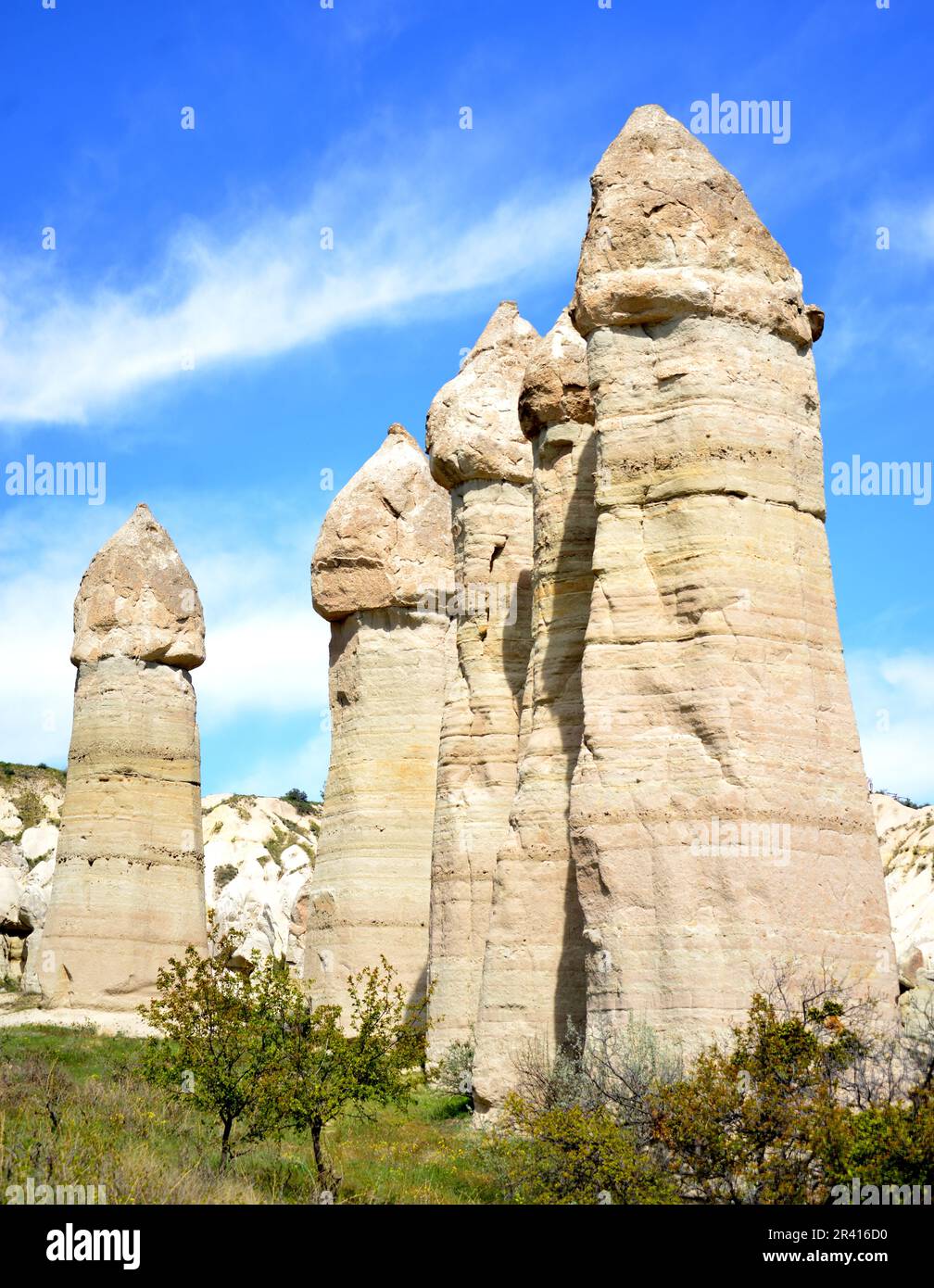 Goreme, positioned between the rock formations called fairy chimneys ...