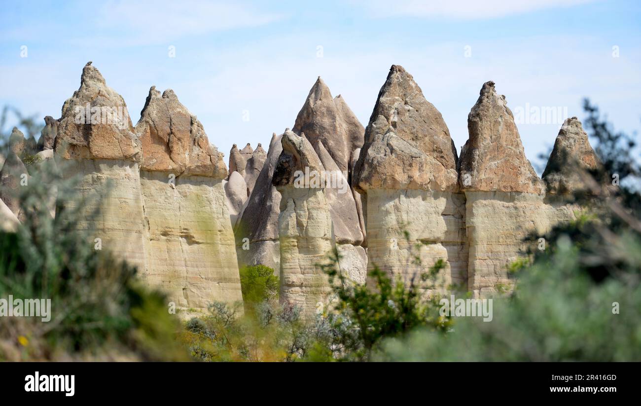 Goreme, positioned between the rock formations called fairy chimneys ...