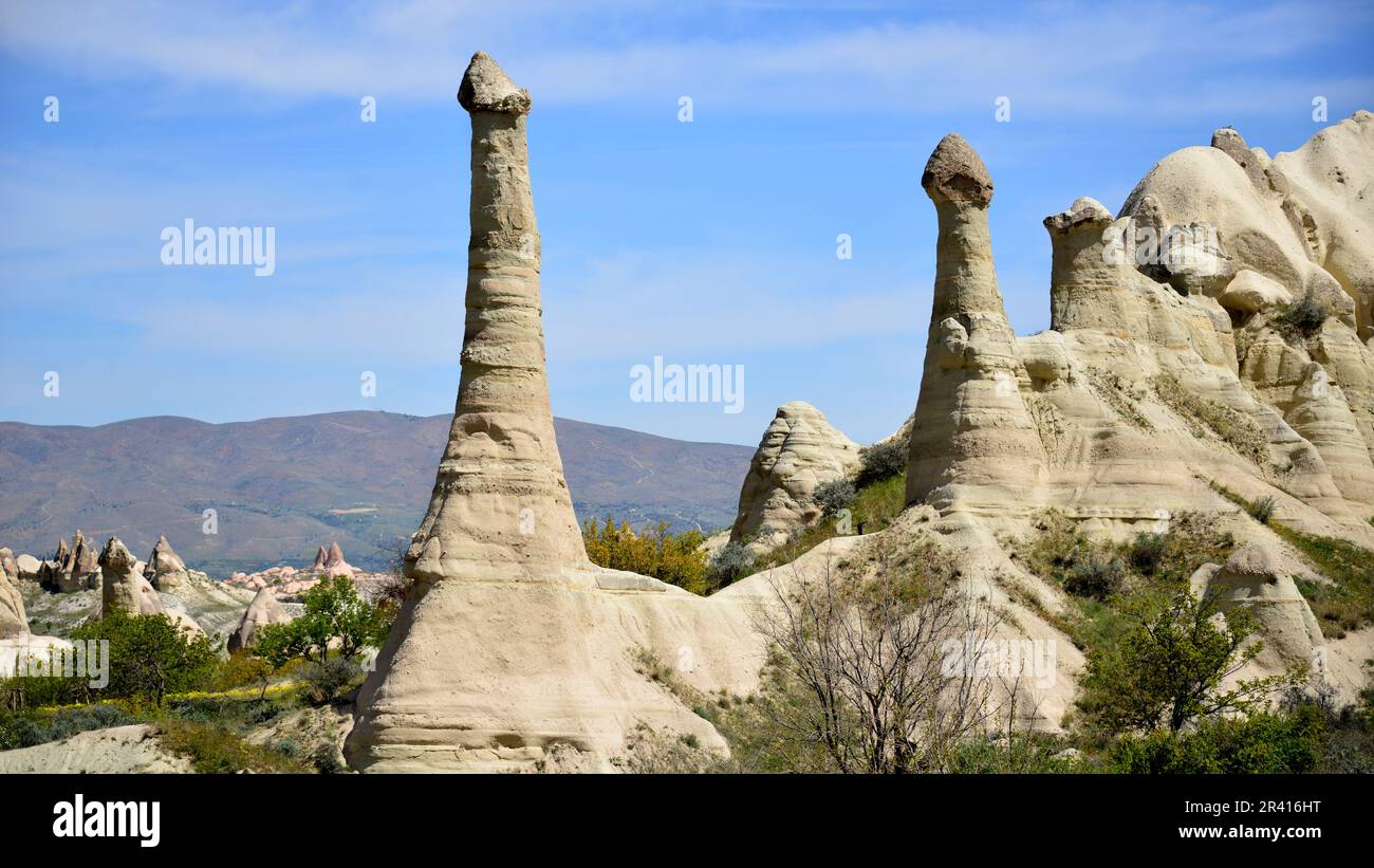 Goreme, positioned between the rock formations called fairy chimneys ...