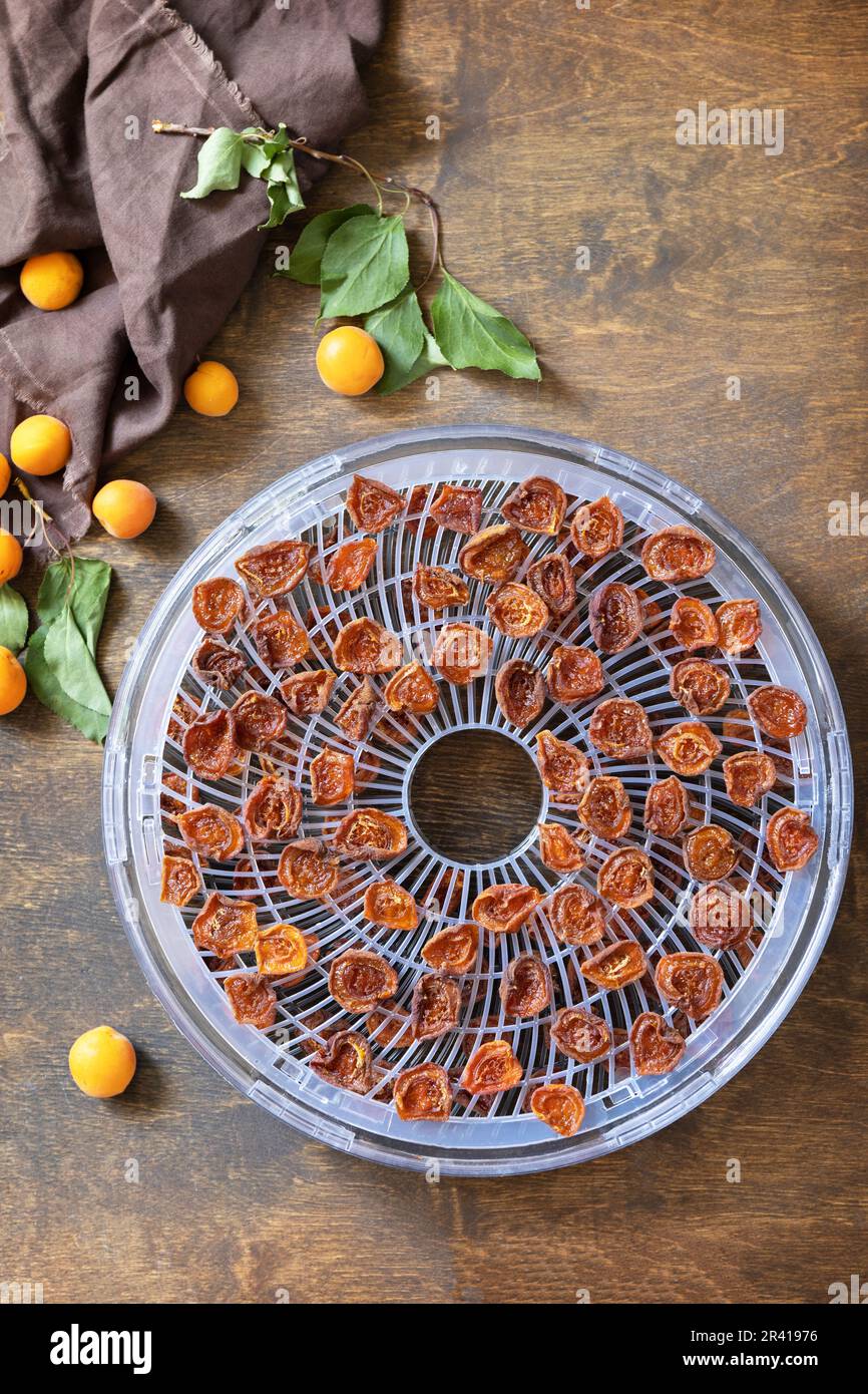 The process of home cooking dried fruits or candied fruit in an ...