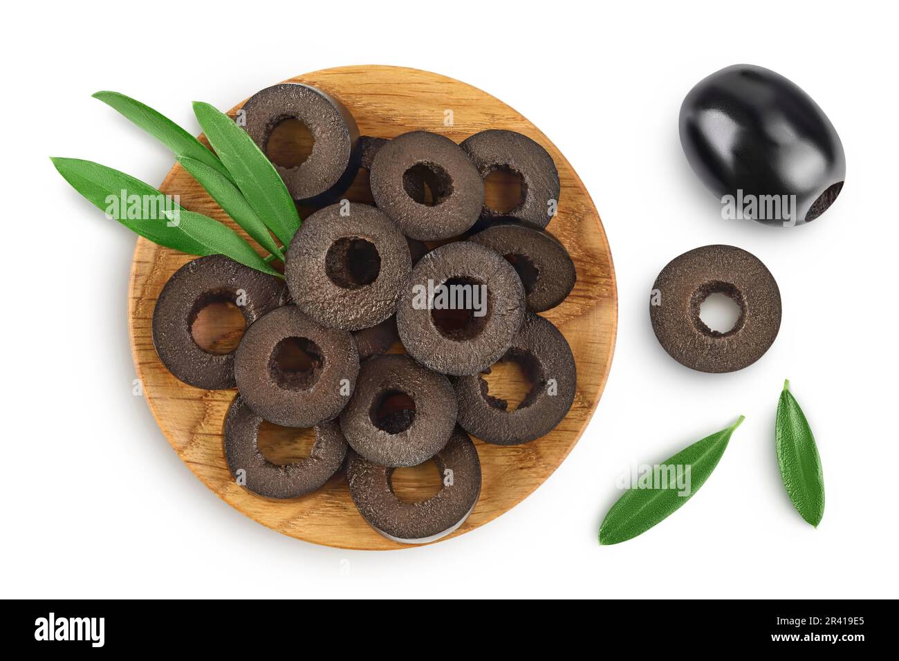 Black olive slices in wooden bowl isolated on a white background with ...