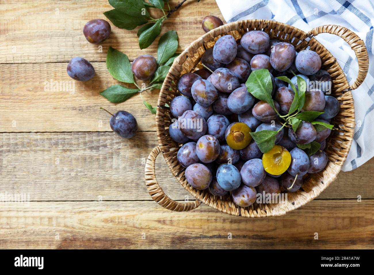 Fruit background, organic fruits. Still life food. Basket of fresh blue ...