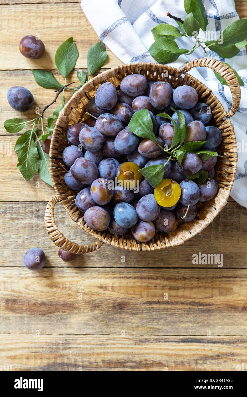 Fruit background, organic fruits. Still life food. Basket of fresh blue ...
