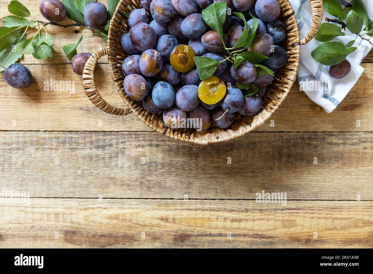 Fruit background, organic fruits. Still life food. Basket of fresh blue ...