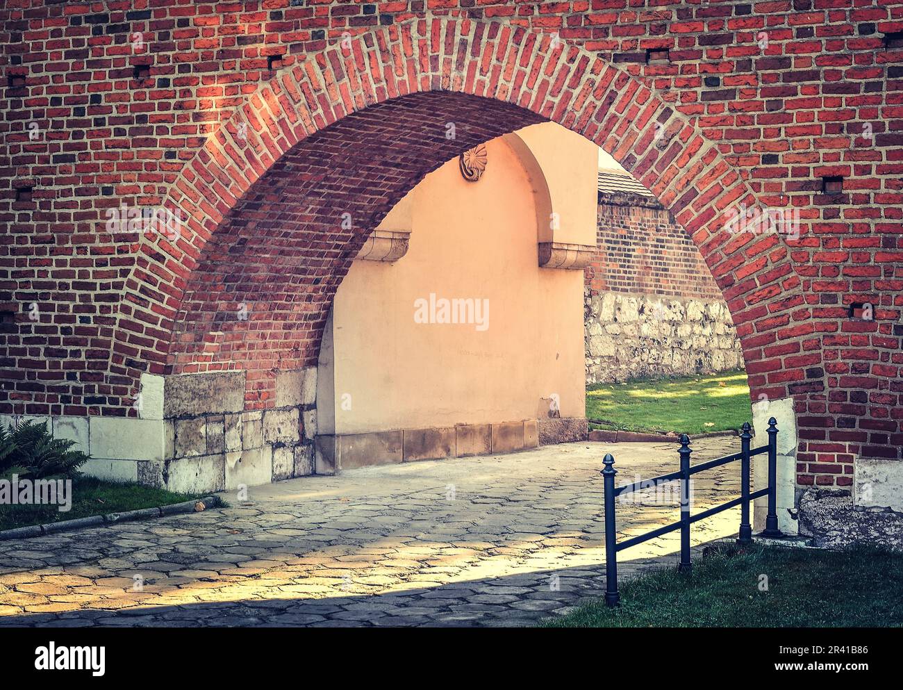Covered way in the town. Footpath with archway made of brick. Photo ...