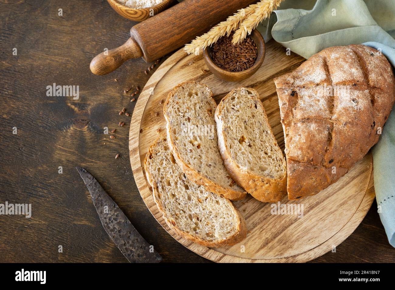 Bread from whole wheat grains, wheat bran, seeds, bio-ingredients over ...
