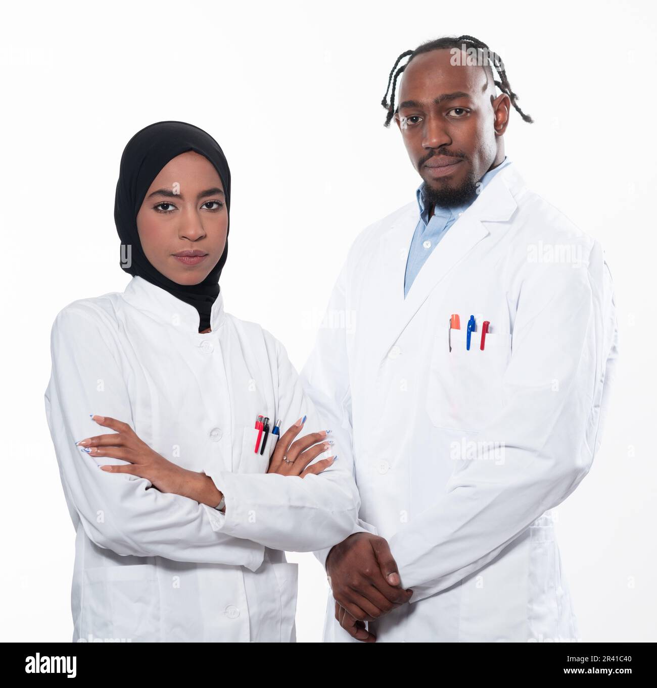 Closeup front view of group of mixed age doctors and nurses standing ...