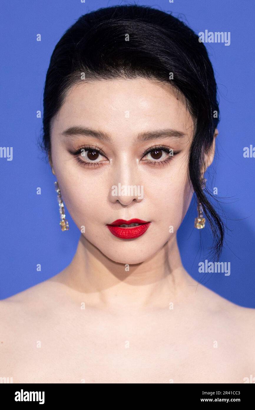 Fan Bingbing poses for photographers upon arrival at the amfAR Cinema ...