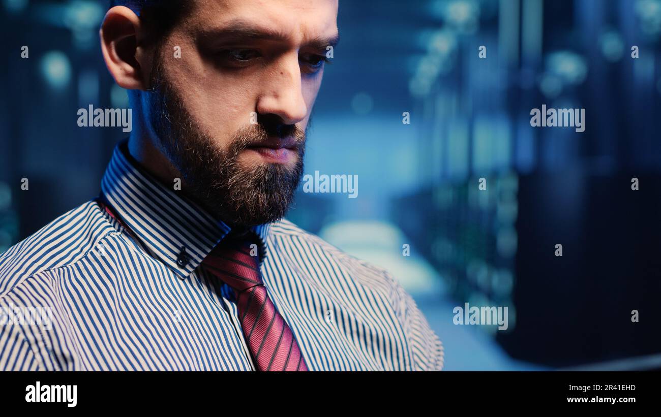 System administrator standing in modern data center Stock Photo - Alamy