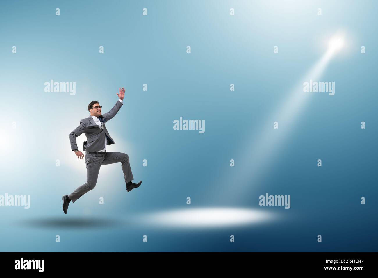 Business people under the spotlight Stock Photo - Alamy