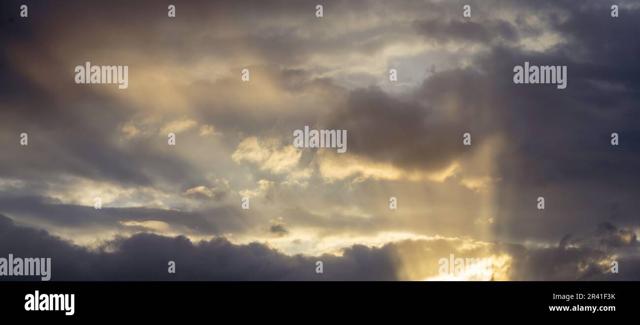 Sunbeam through the haze on blue sky Dramatic Golden sunset Background ...