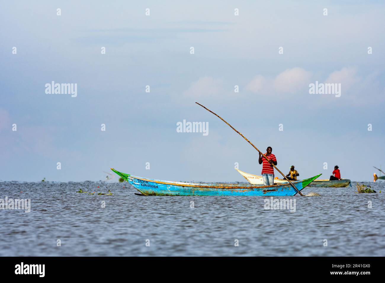 Local fishermen fishing in small boats on Lake Victoria. Kisumu, Kenya ...