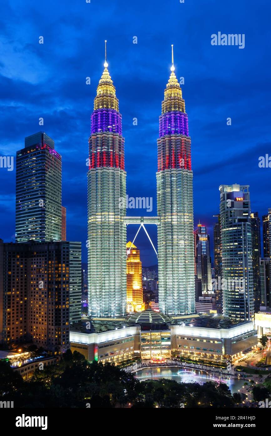 Petronas Twin Towers skyscrapers KLCC skyline in the evening portrait ...