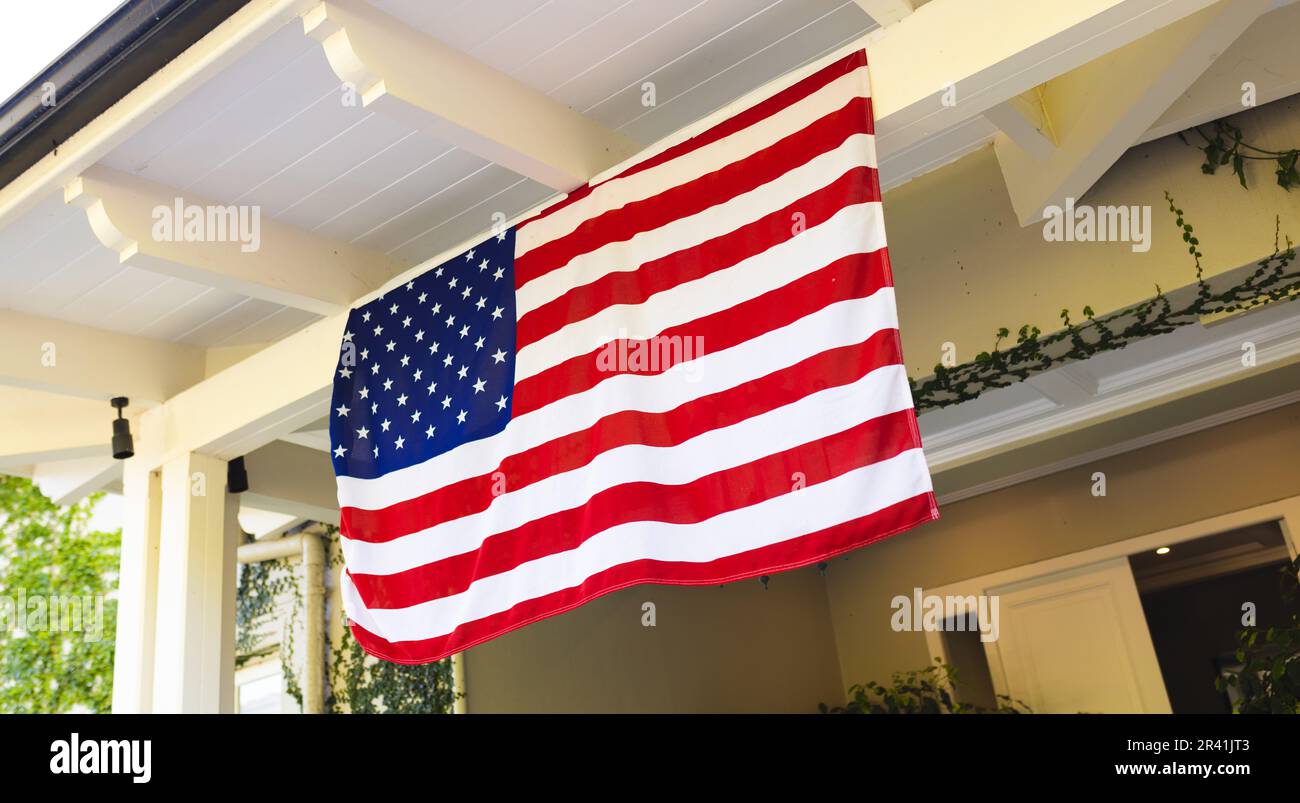 Flag hanging from roof hi-res stock photography and images - Alamy