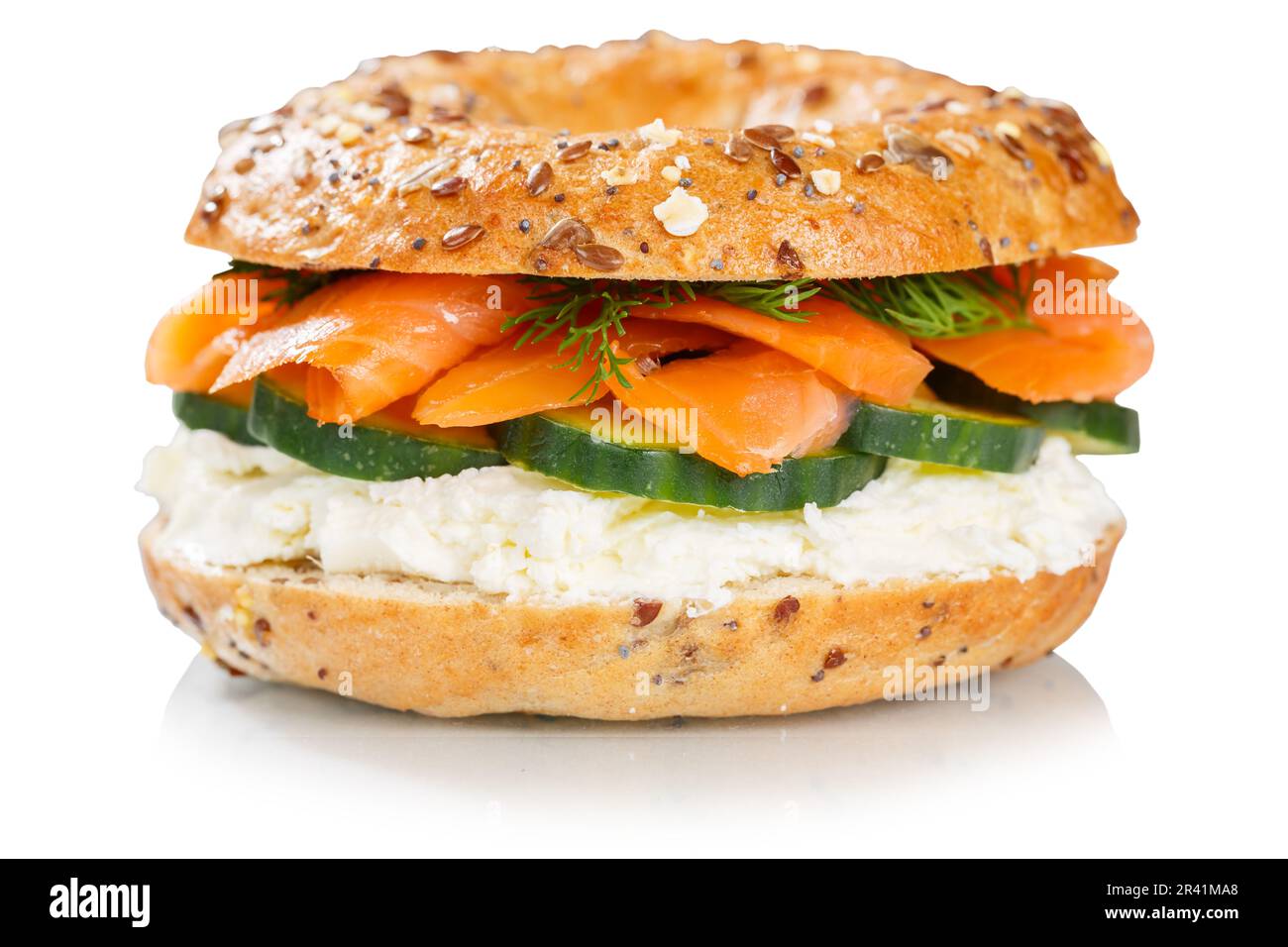 Bagel roll topped with salmon fish sandwich for breakfast isolated ...
