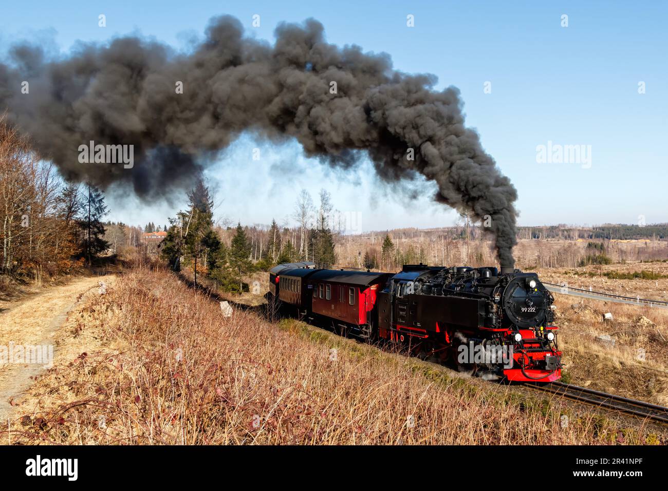 Steam train of Brockenbahn railroad steam train leaving Drei Annen ...