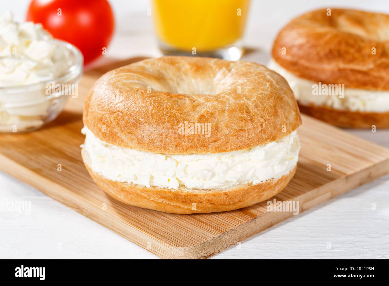 Bagel roll sandwich for breakfast topped with cream cheese in Stuttgart ...