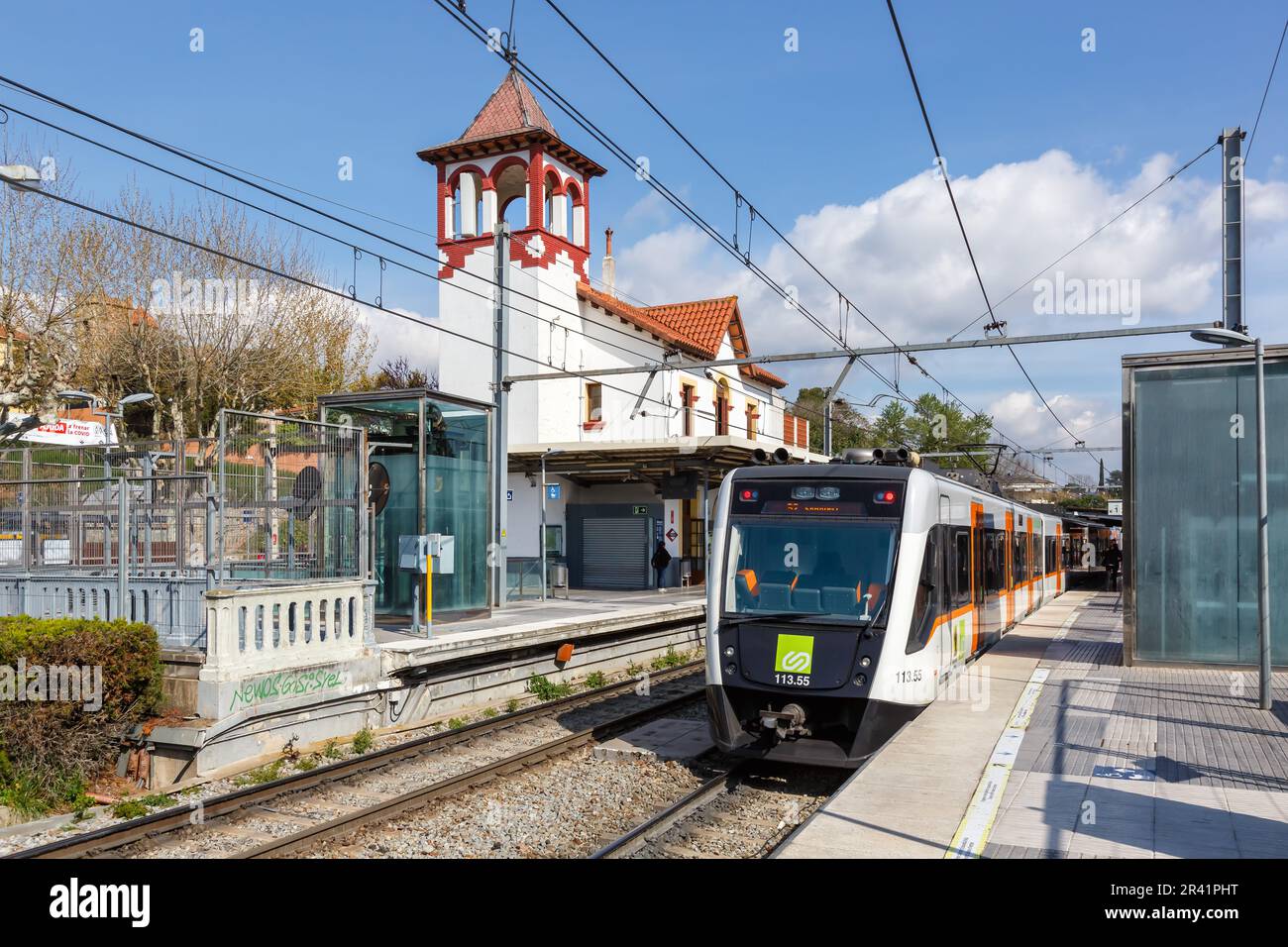 Local train of FGC train railroad in Valldoreix station in Barcelona ...