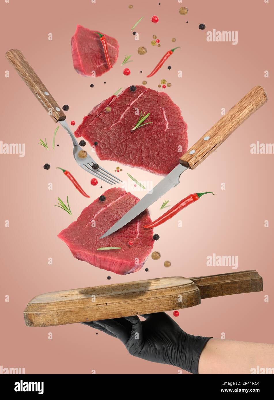 Hand cutting red peppers pieces hi-res stock photography and images - Alamy