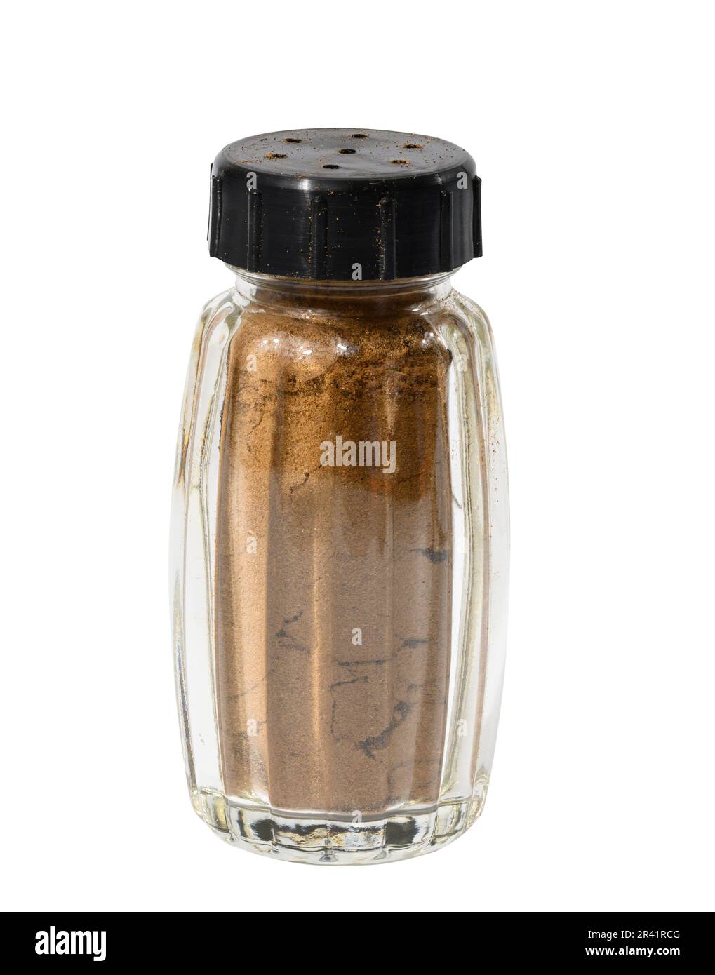 Transparent glass jar with ground cinnamon on a white isolated ...