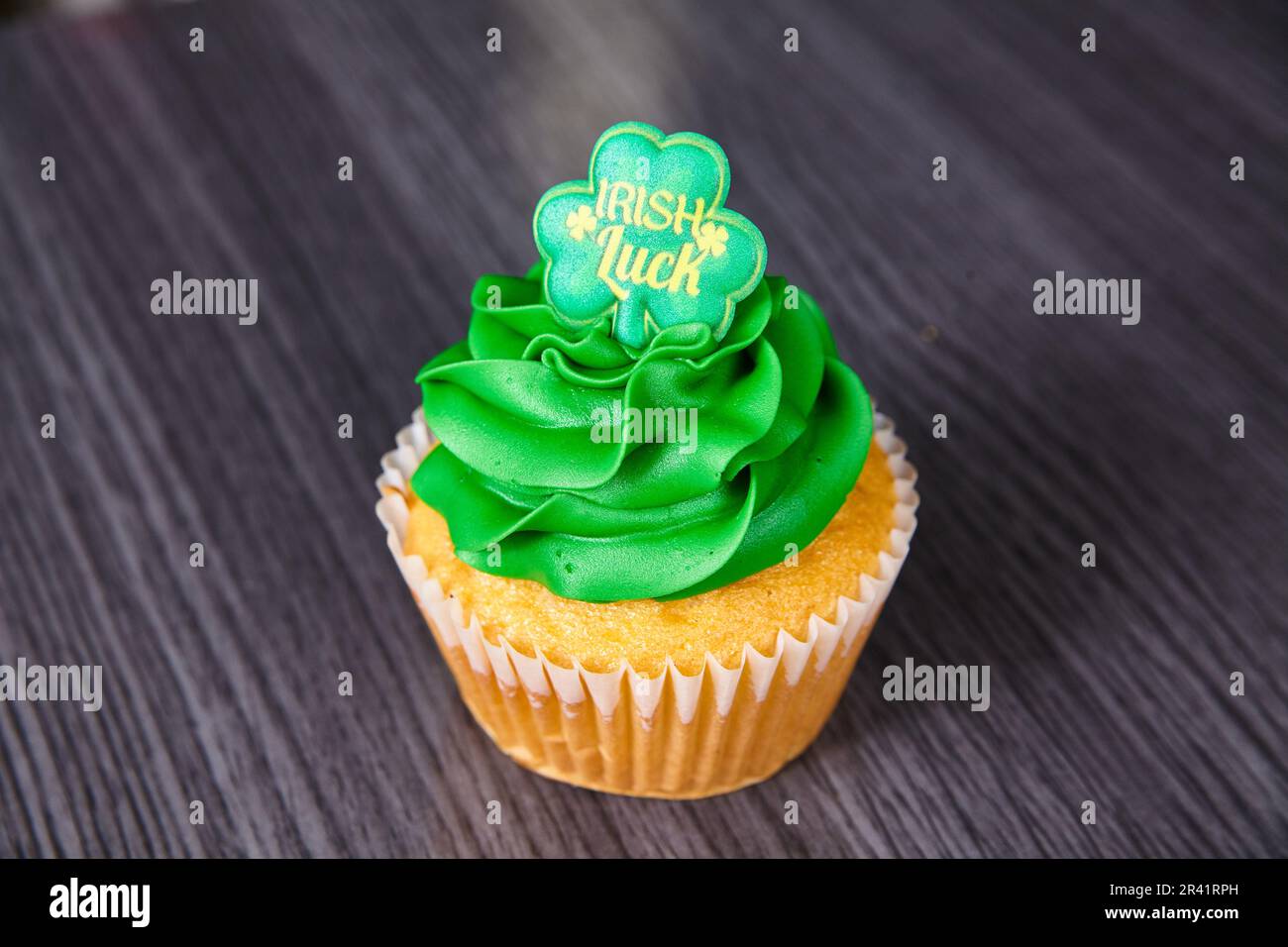 Vanilla St. Patrick’s Day cupcake green frosting Irish Luck four-leaf ...