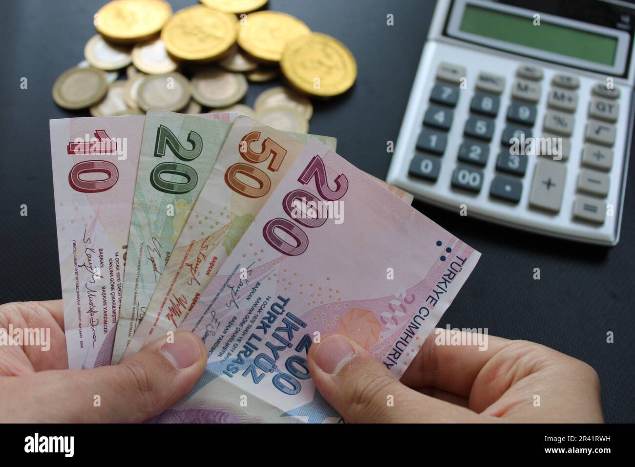 Hand holding turkish money hi-res stock photography and images - Alamy